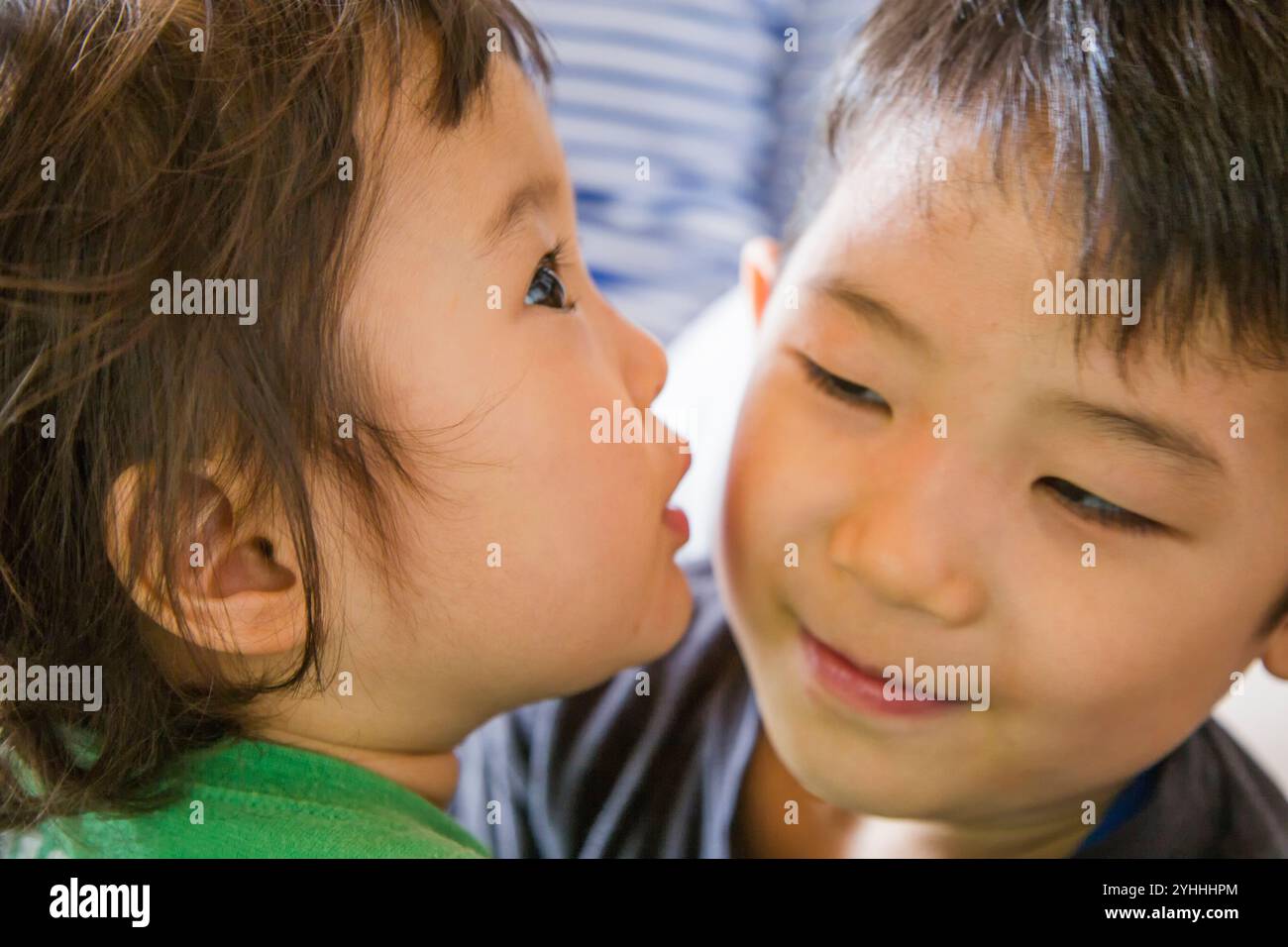 Brother and sister talking to each other Stock Photo - Alamy