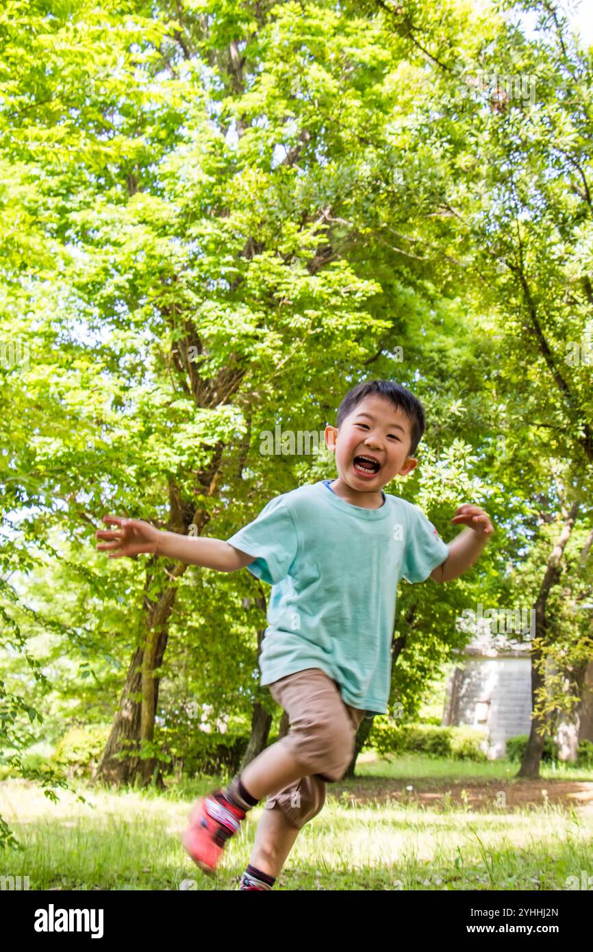 Japanese boy running in park hi-res stock photography and images - Alamy