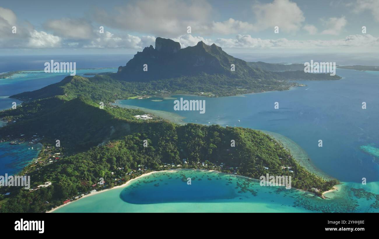 Breathtaking aerial panorama Bora Bora island green mountains and ...