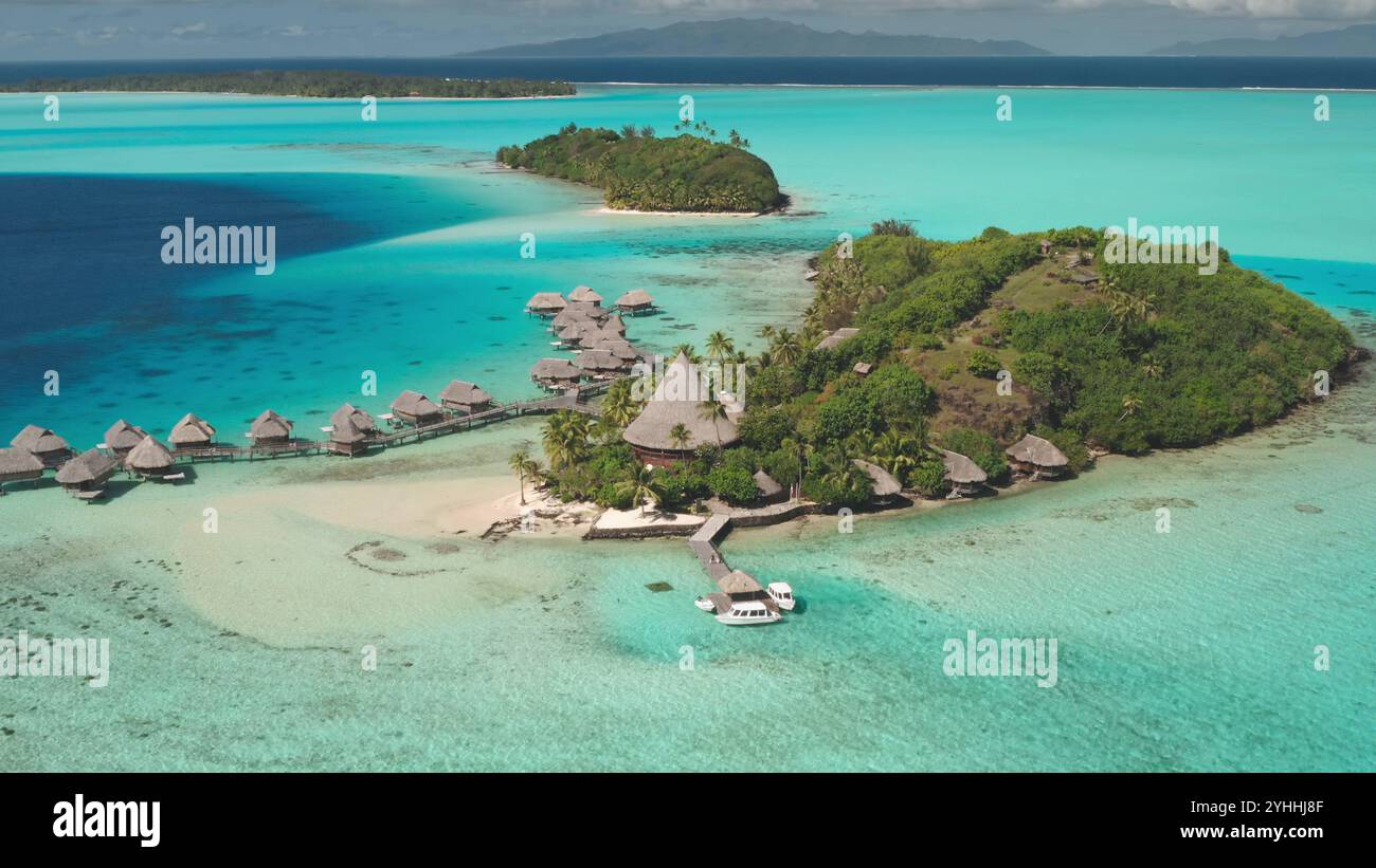 Breathtaking aerial view of overwater bungalows on Bora Bora island ...