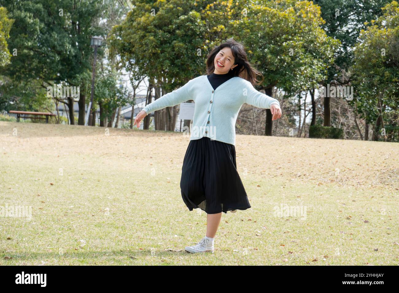 Woman with spread arms hi-res stock photography and images - Alamy