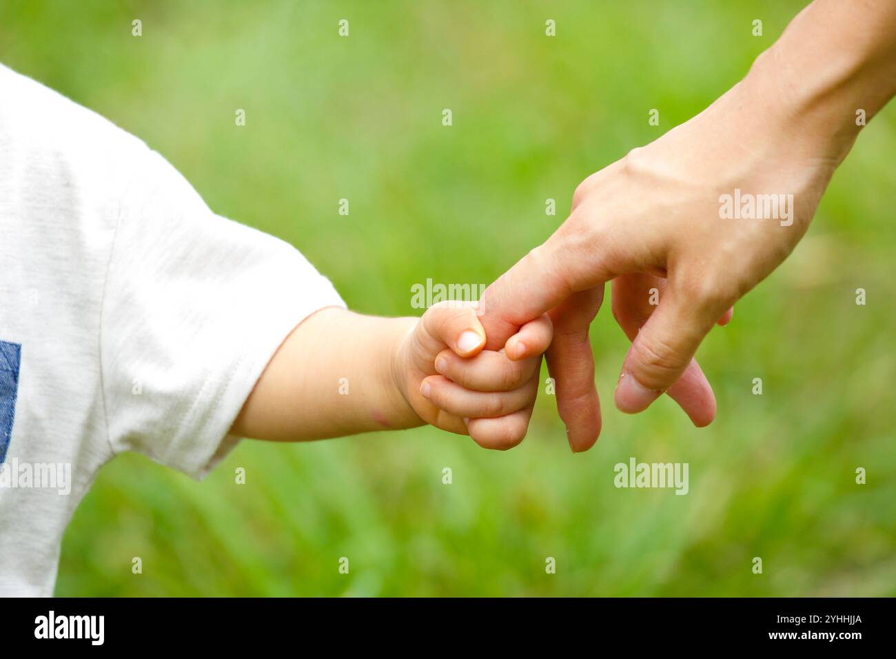 Parent and child Hand Stock Photo - Alamy