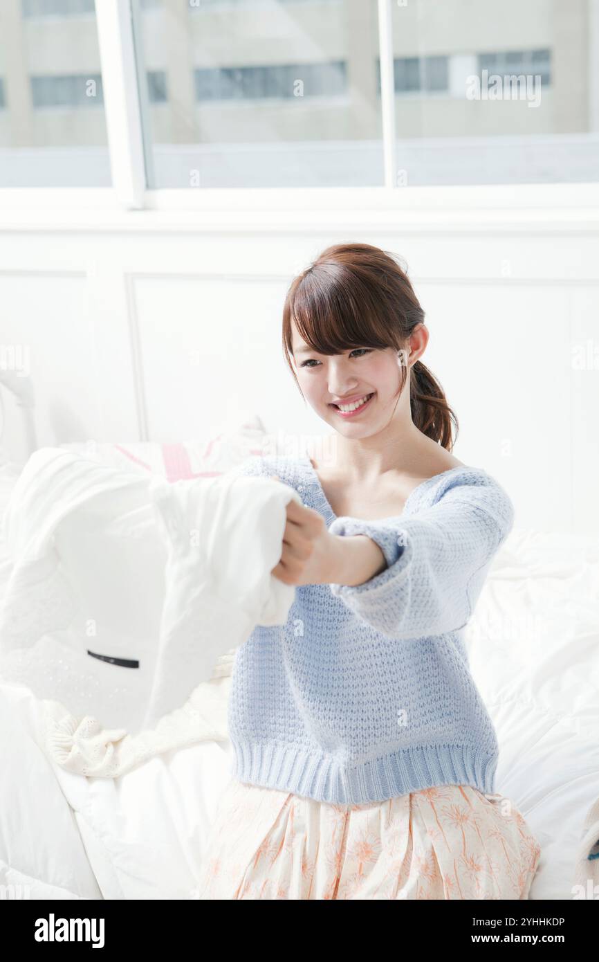 Female university student choosing clothes Stock Photo - Alamy