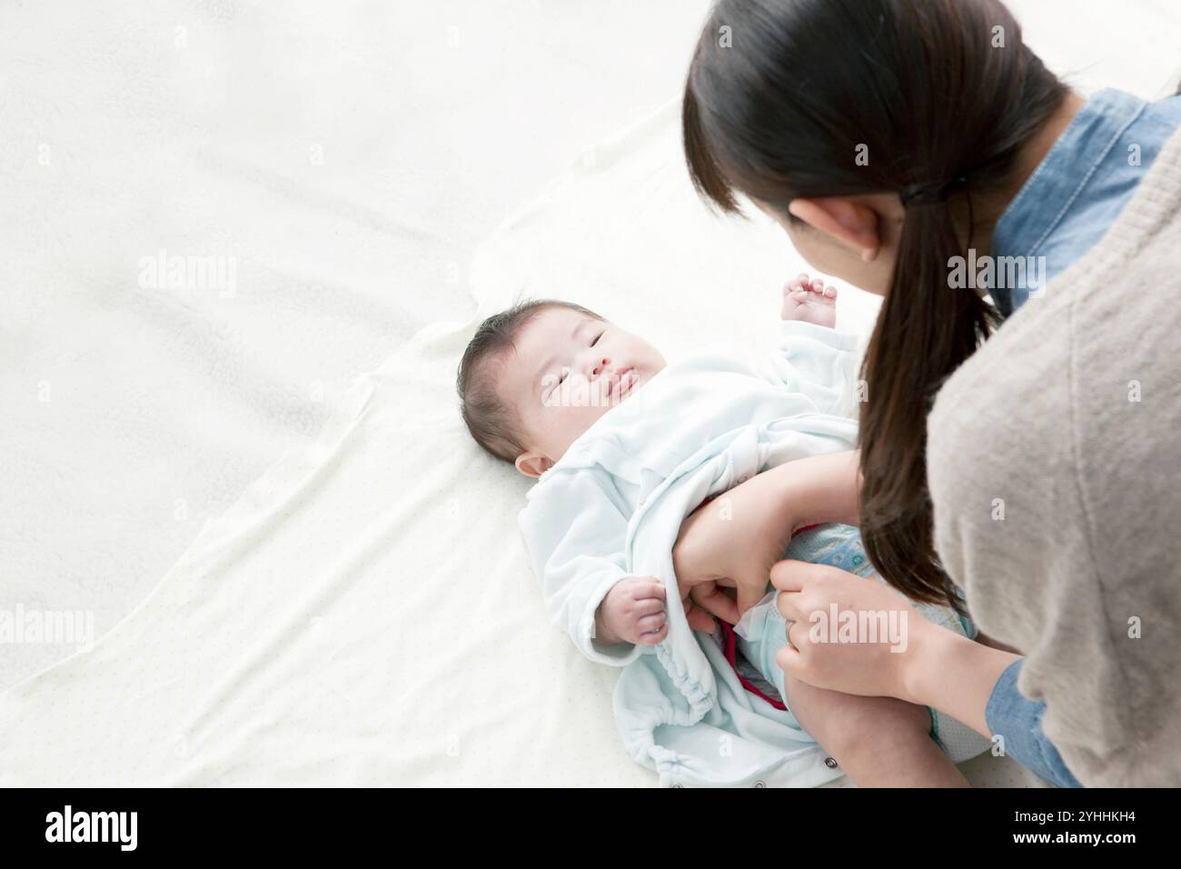 Changing diaper hi-res stock photography and images - Alamy
