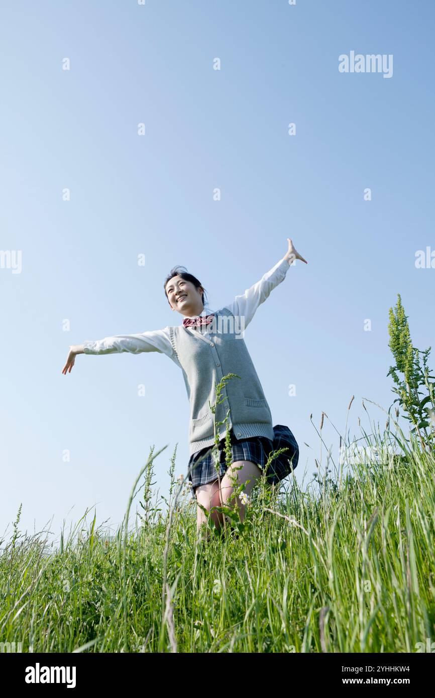 Girls with spread arms hi-res stock photography and images - Alamy
