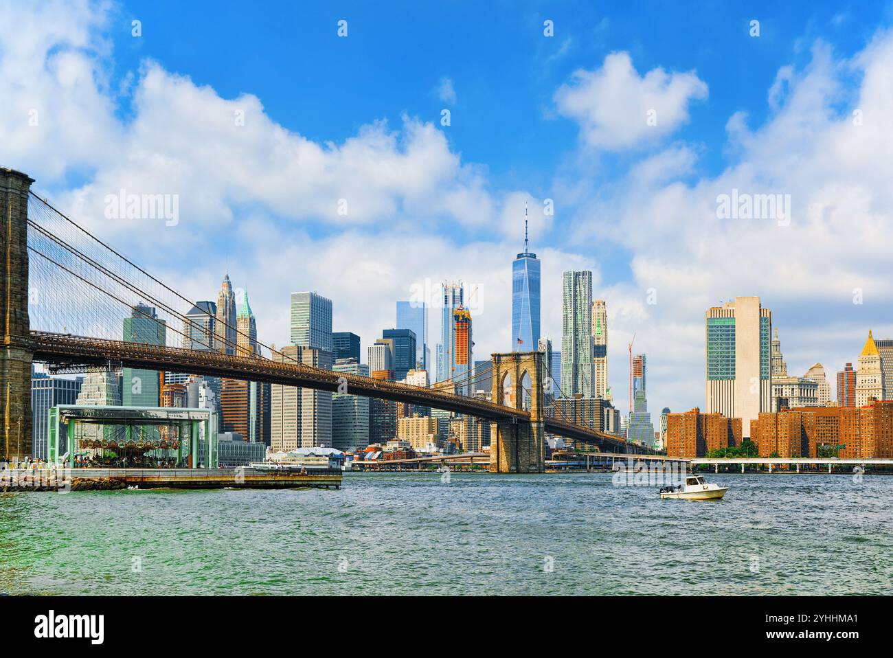 Suspension Brooklyn Bridge across the East River between the Lower ...