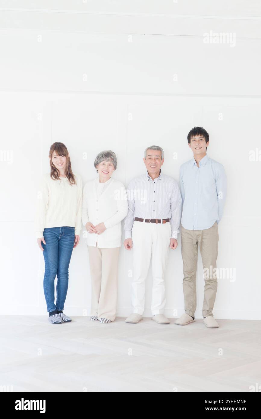 Smiling two generation family portrait Stock Photo - Alamy
