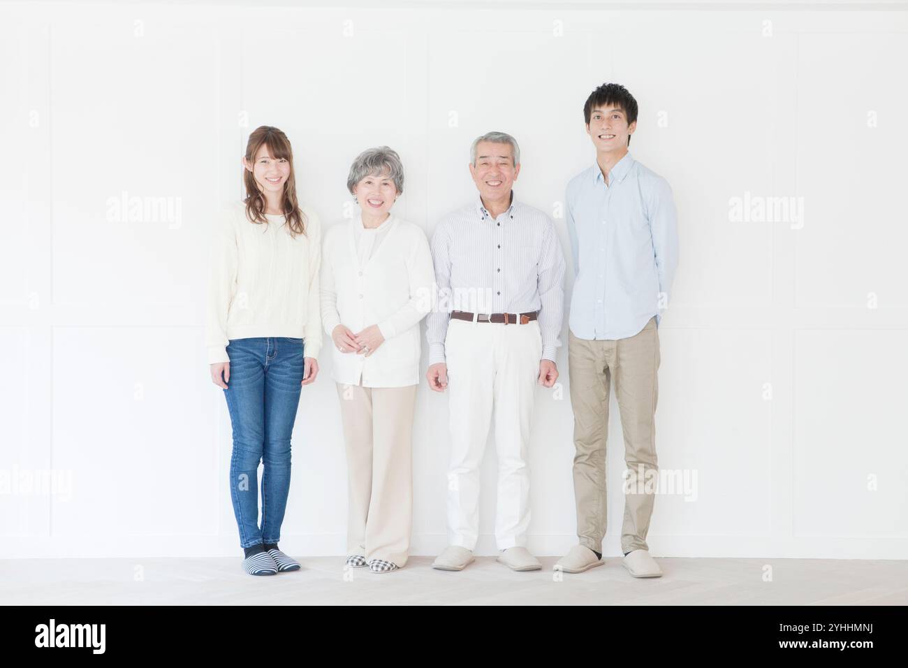Smiling two generation family portrait Stock Photo - Alamy