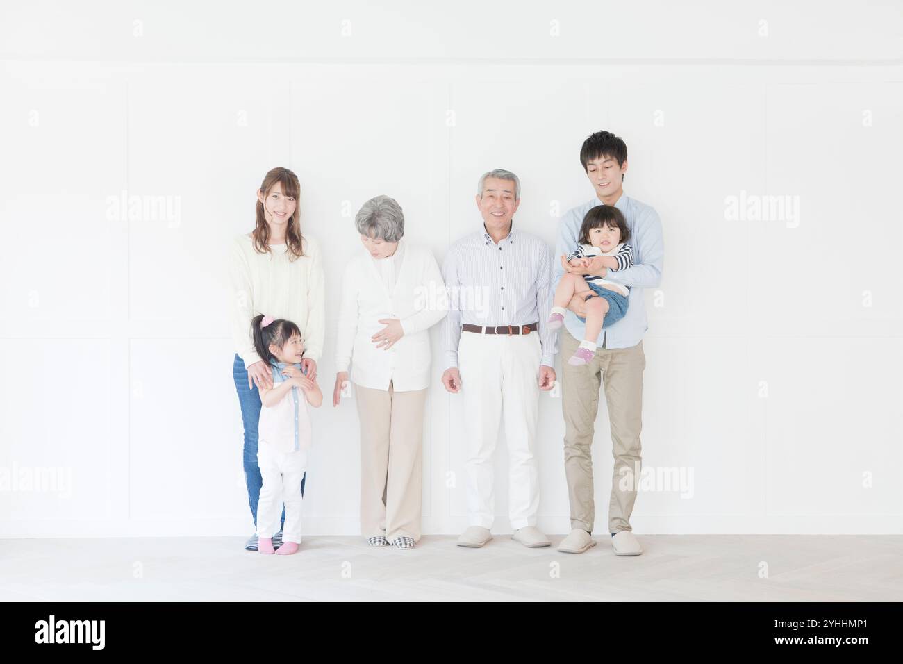 Smiling three generation family portrait Stock Photo - Alamy