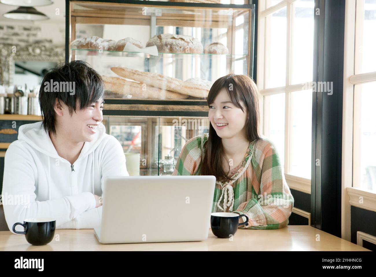 Sitting side by side on hi-res stock photography and images - Alamy