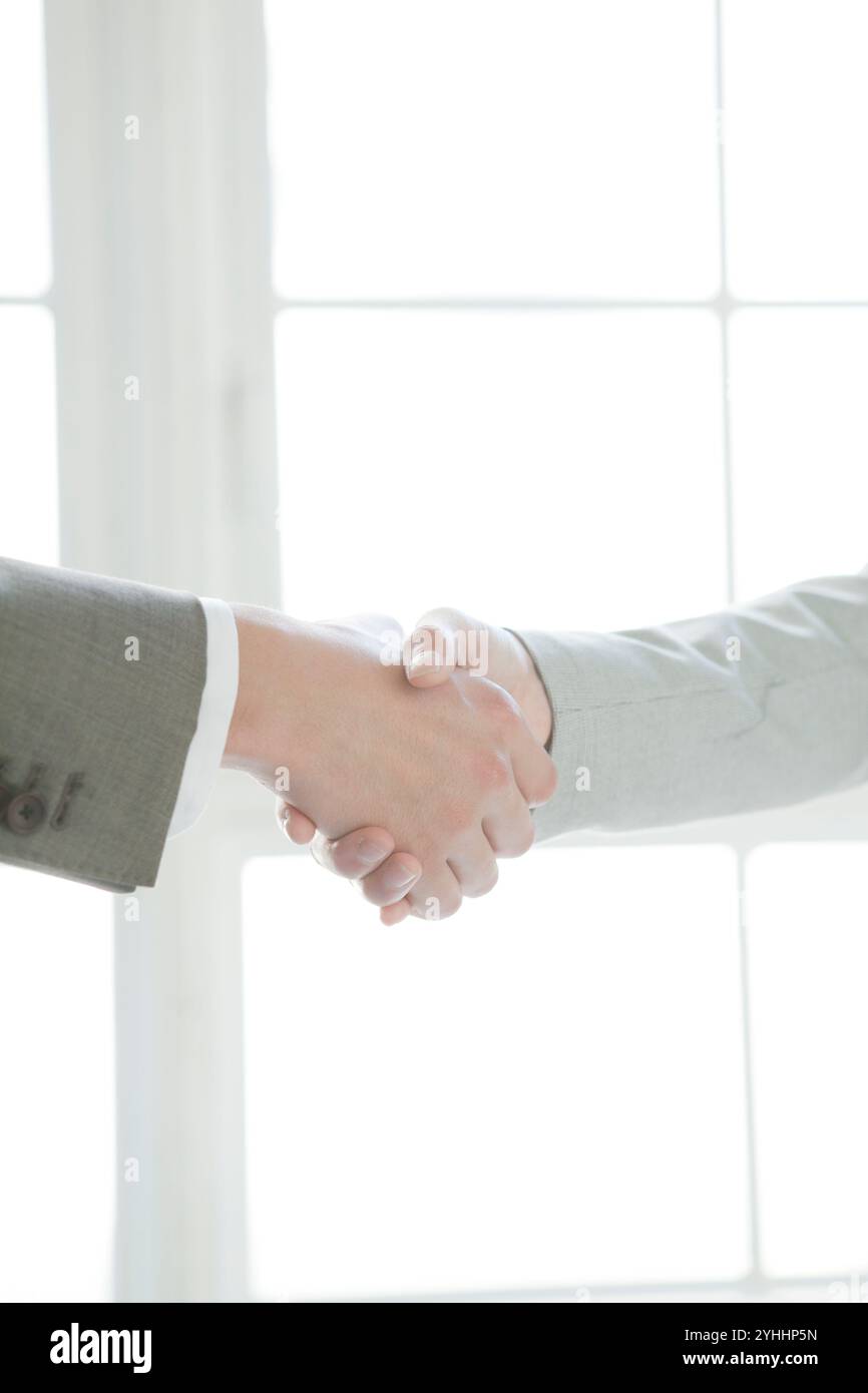 Businessman shaking hands businesswoman colleague hi-res stock ...
