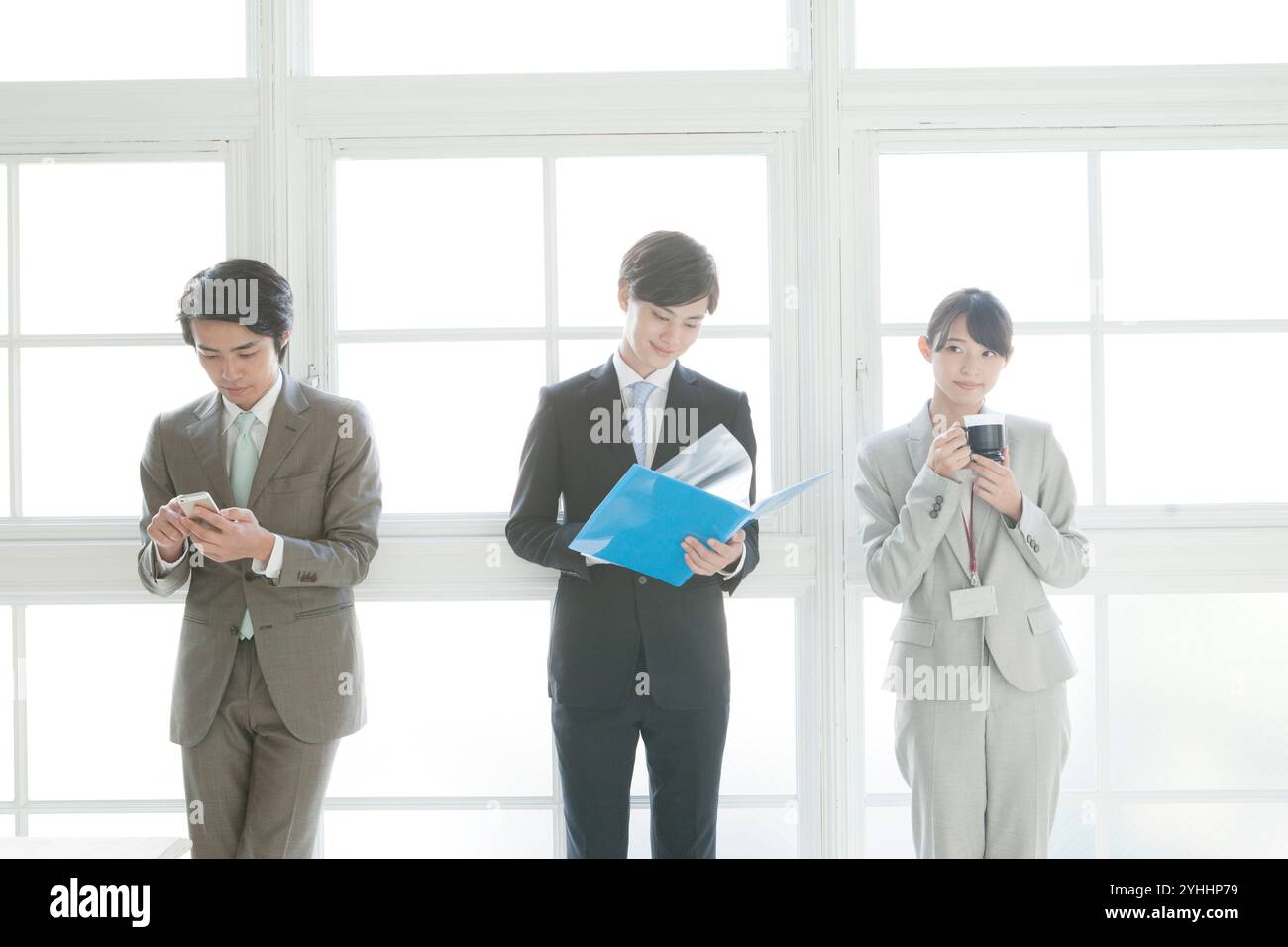 Three office workers during break Stock Photo - Alamy