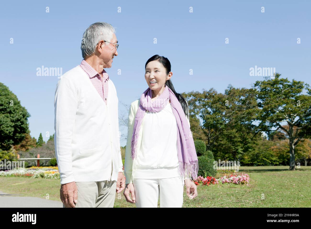 Mature couple facing each other smiling hi-res stock photography and ...