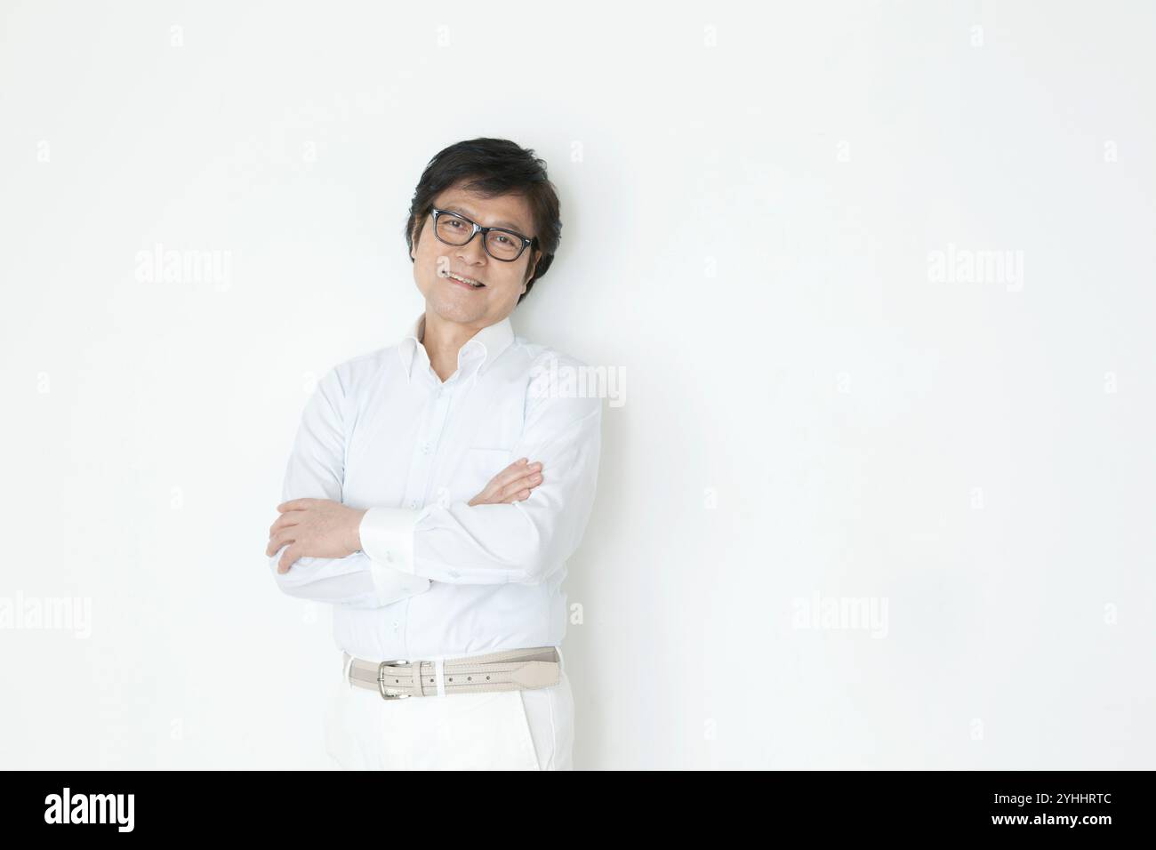 Smiling man in his 60s Stock Photo - Alamy