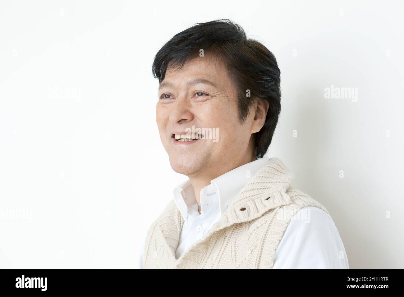Smiling man in his 60s Stock Photo - Alamy
