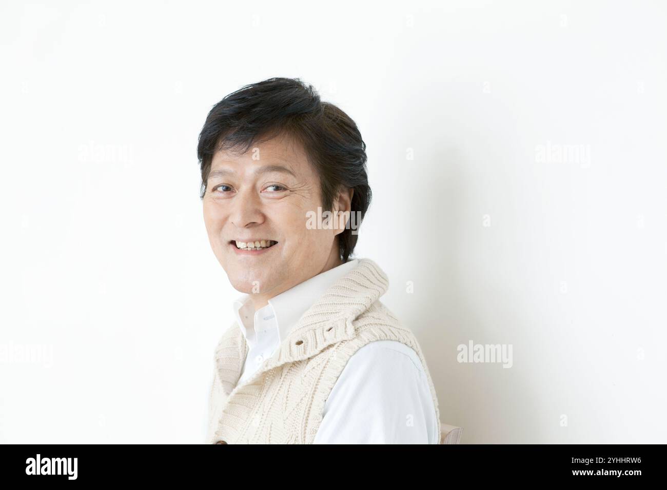 Smiling man in his 60s Stock Photo - Alamy