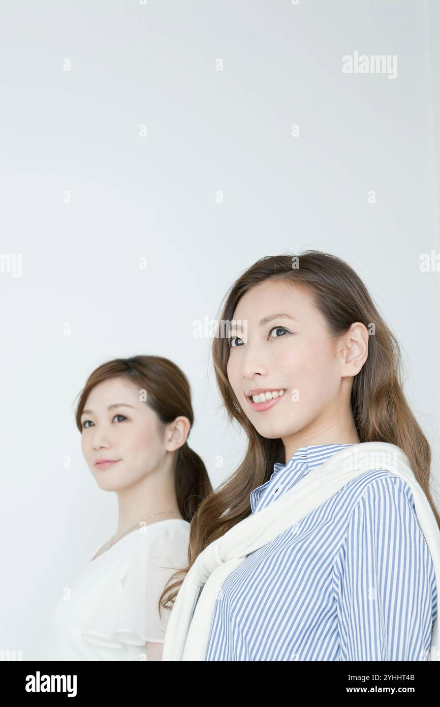 Two women in their 20s Stock Photo - Alamy