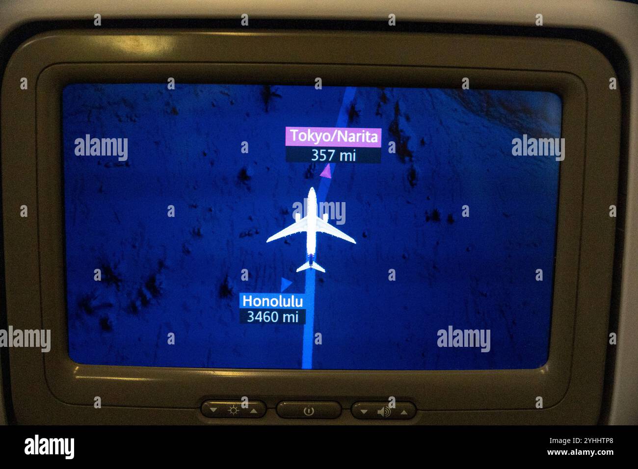 Flight tracking display shows airplane route over the Pacific Ocean ...