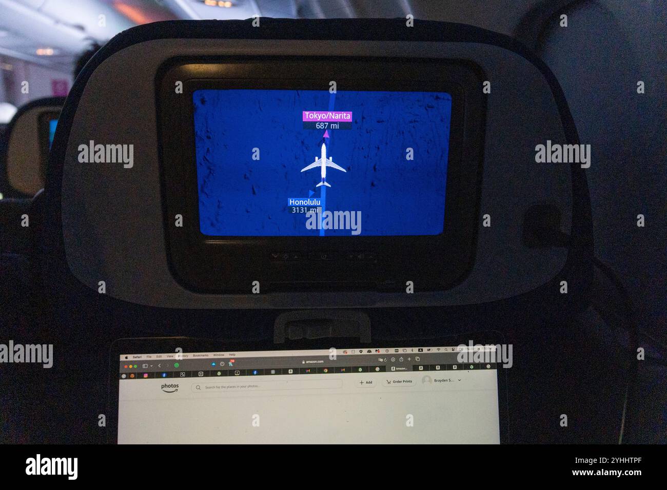 Flight tracking display shows airplane route over the Pacific Ocean ...