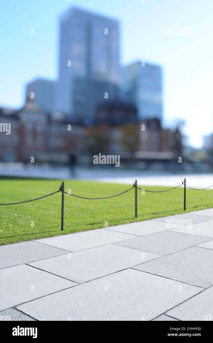 Cobblestones and skyscrapers in Marunouchi Square Stock Photo - Alamy