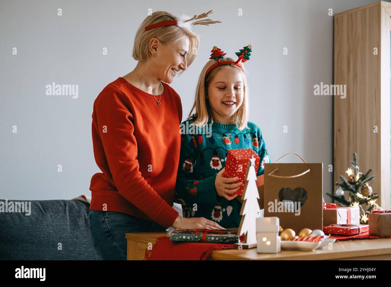 Mother and daughter strengthening family bonds through Christmas gift ...