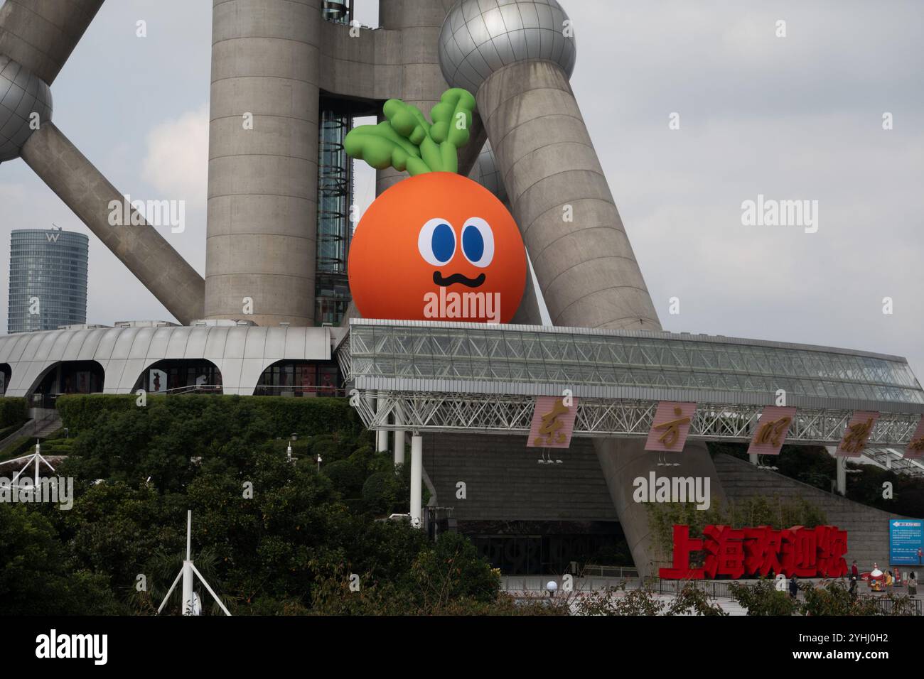 A giant mojo carrot is seen under the Oriental Pearl Tower in Shanghai ...