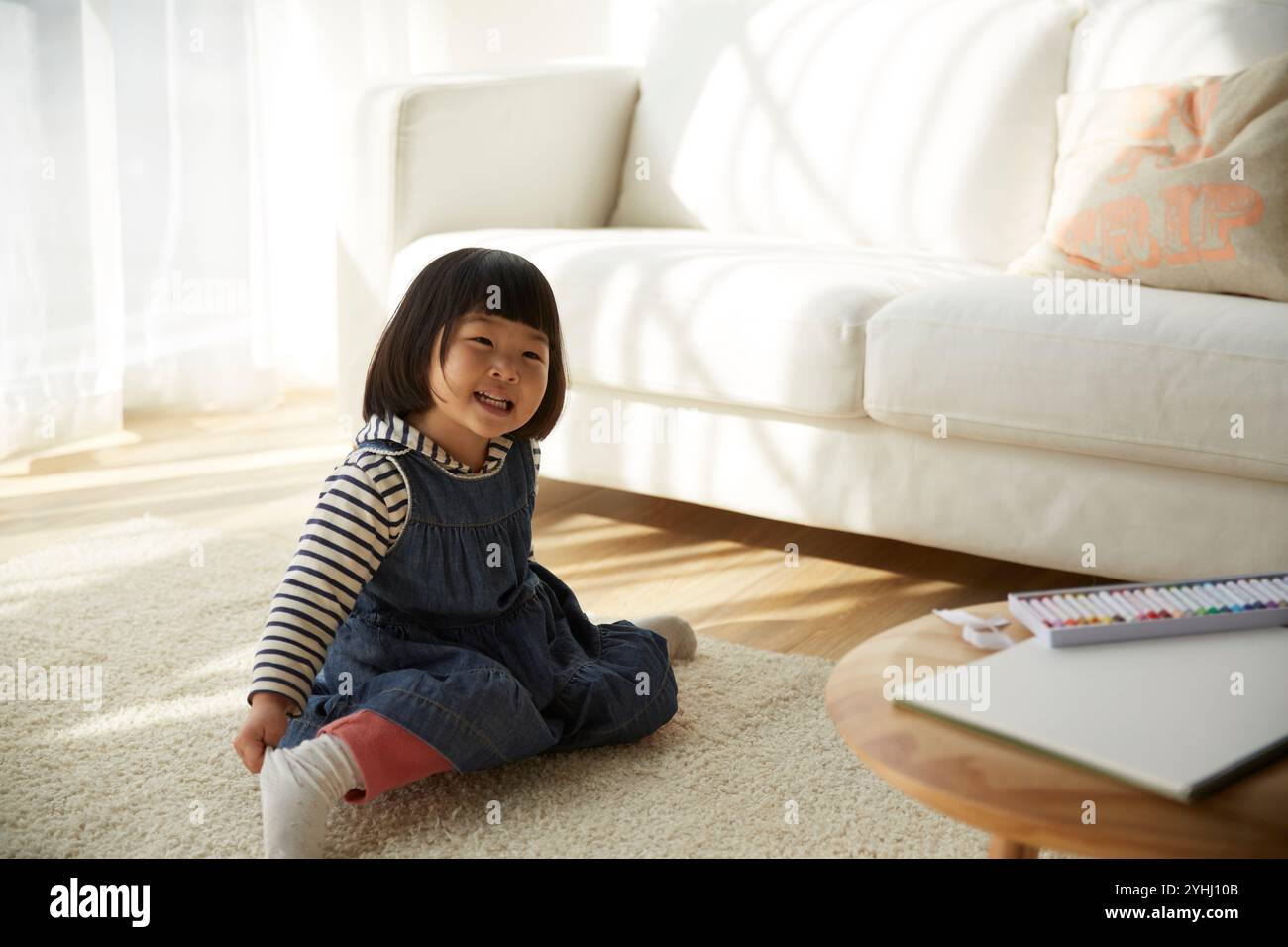 Smiling girl sit on hi-res stock photography and images - Alamy