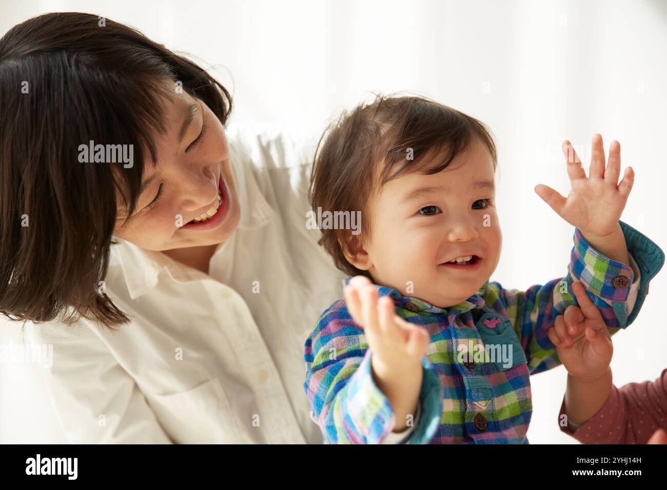 Grumpy boy and mother Stock Photo - Alamy