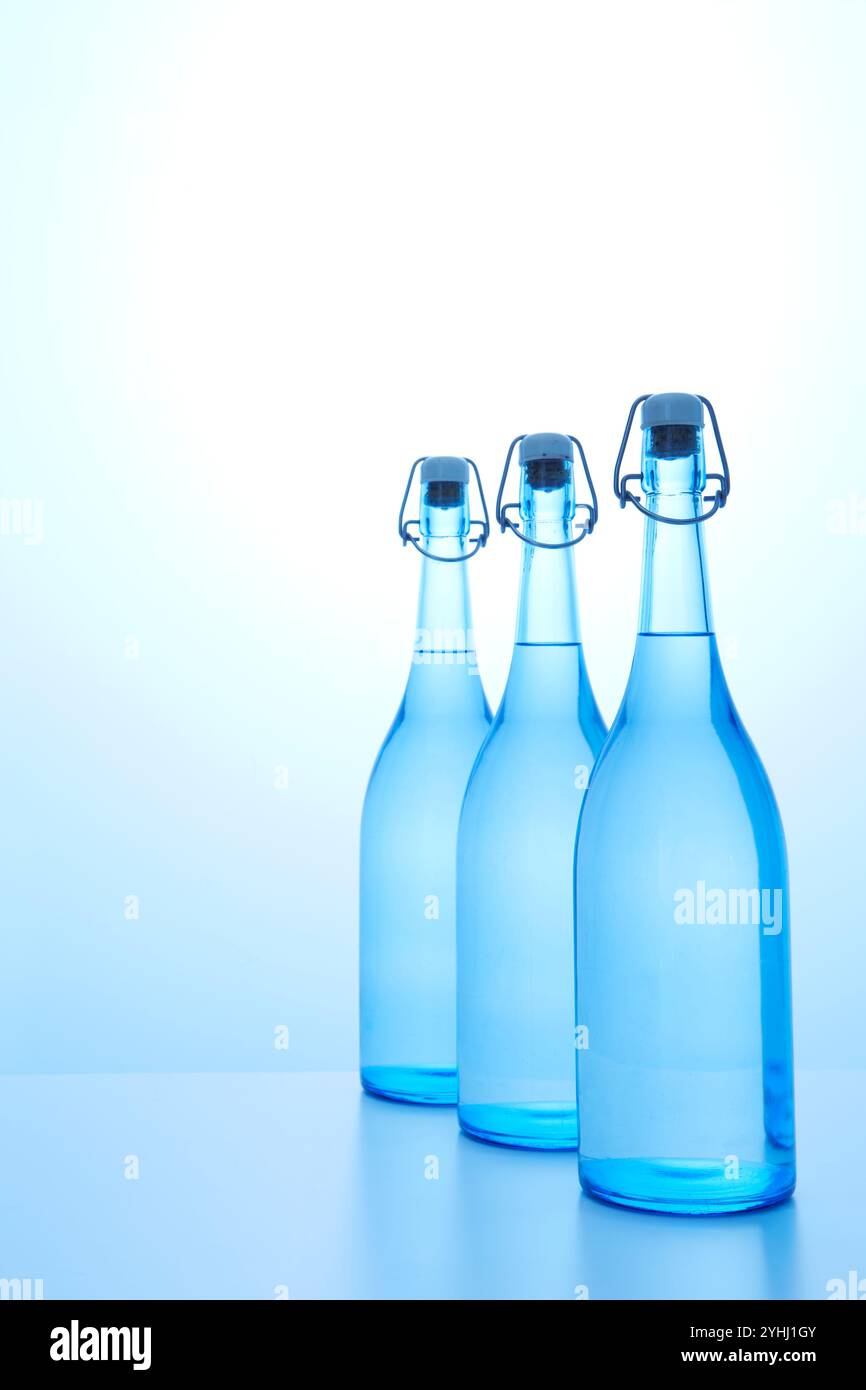 Three glass bottles hi-res stock photography and images - Alamy