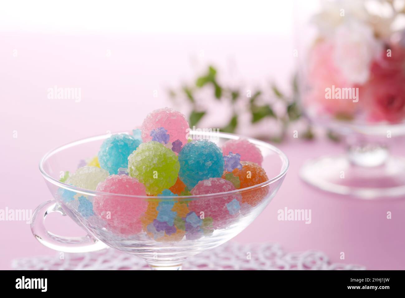 Colourful candy balls and flowers in a glass vessel Stock Photo - Alamy