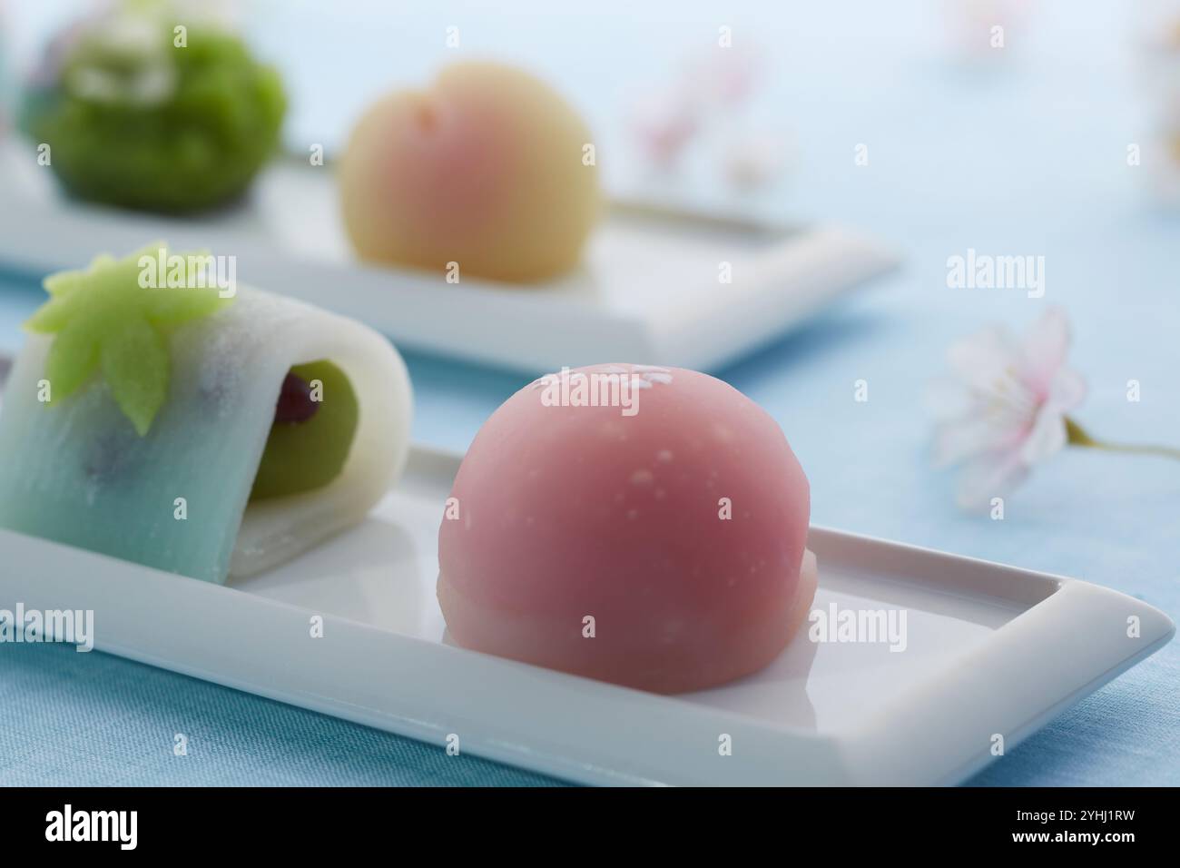 Pastel-coloured Japanese sweets and cherry blossom Stock Photo - Alamy