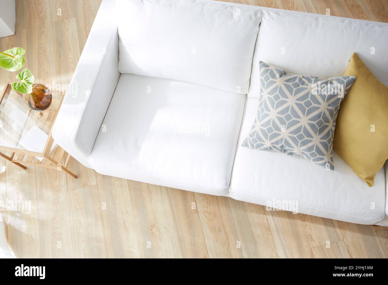 Overhead view of the sofa by the bright window Stock Photo - Alamy