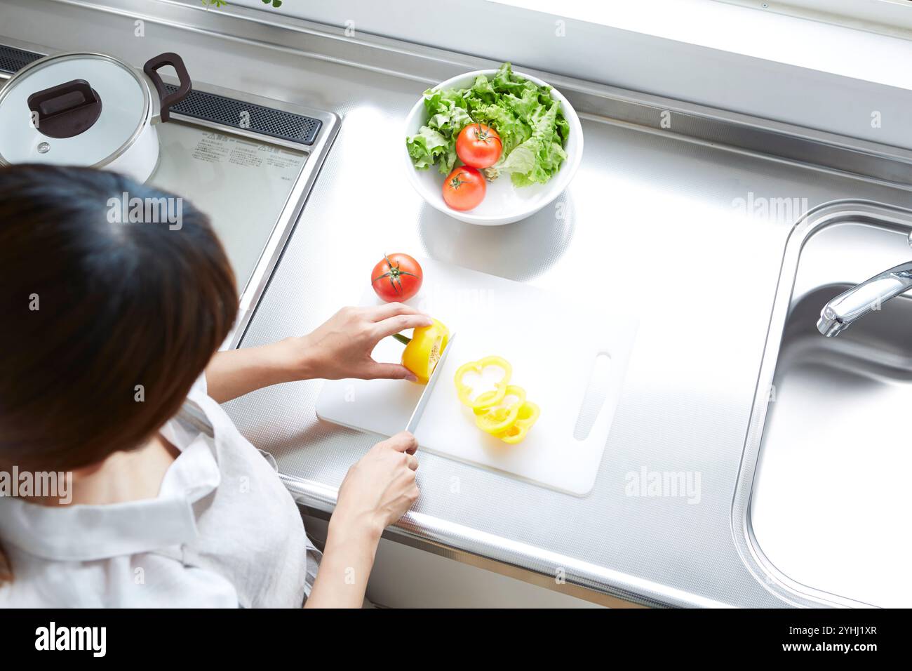 Woman cutting vegetables in hi-res stock photography and images - Alamy