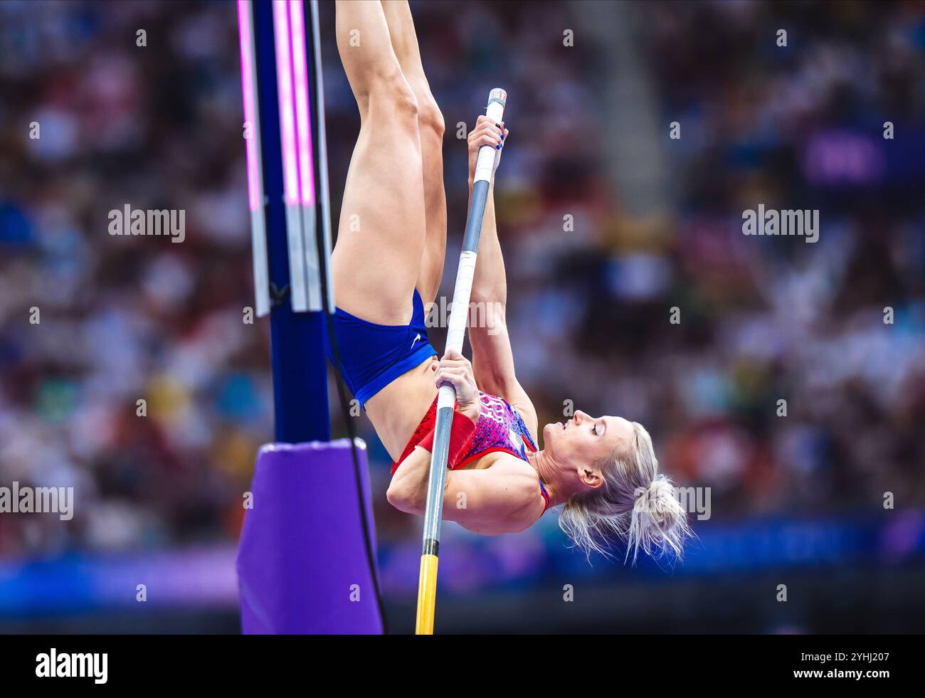 Katie Moon participating in the pole vault at the Paris 2024 Olympic ...