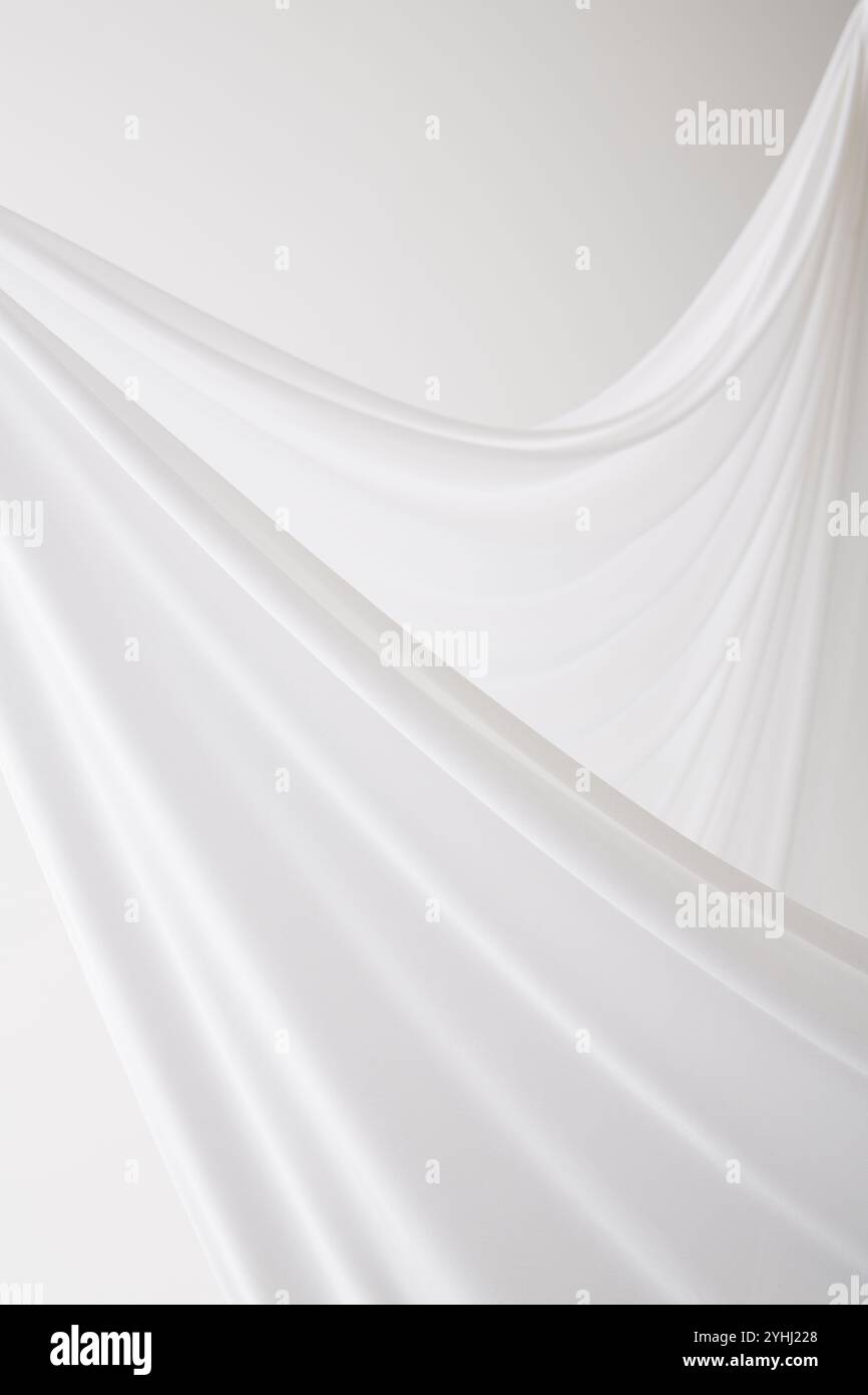 Draped fabric on white background Stock Photo - Alamy