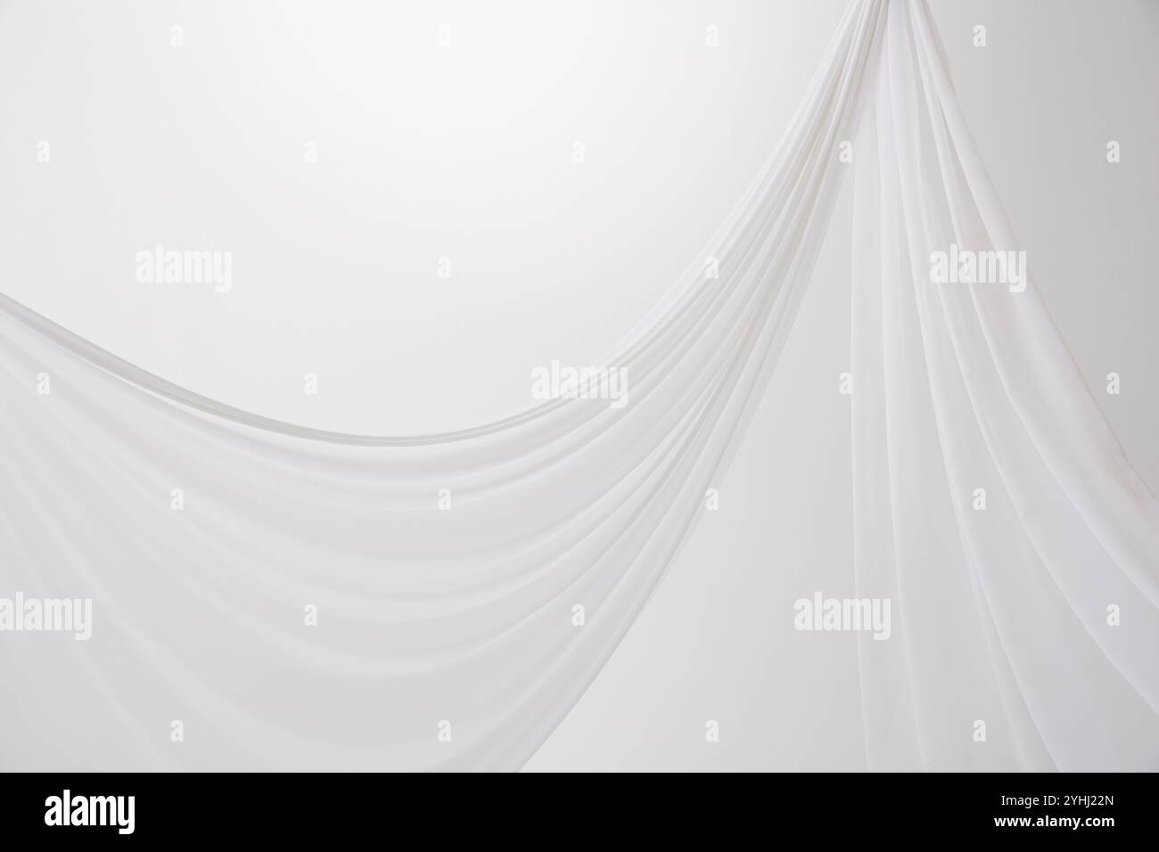 Draped fabric on white background Stock Photo - Alamy