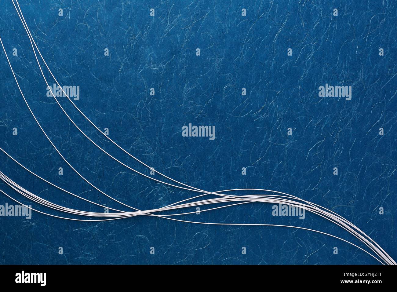 Dark blue Japanese paper and white mizuhiki Stock Photo - Alamy