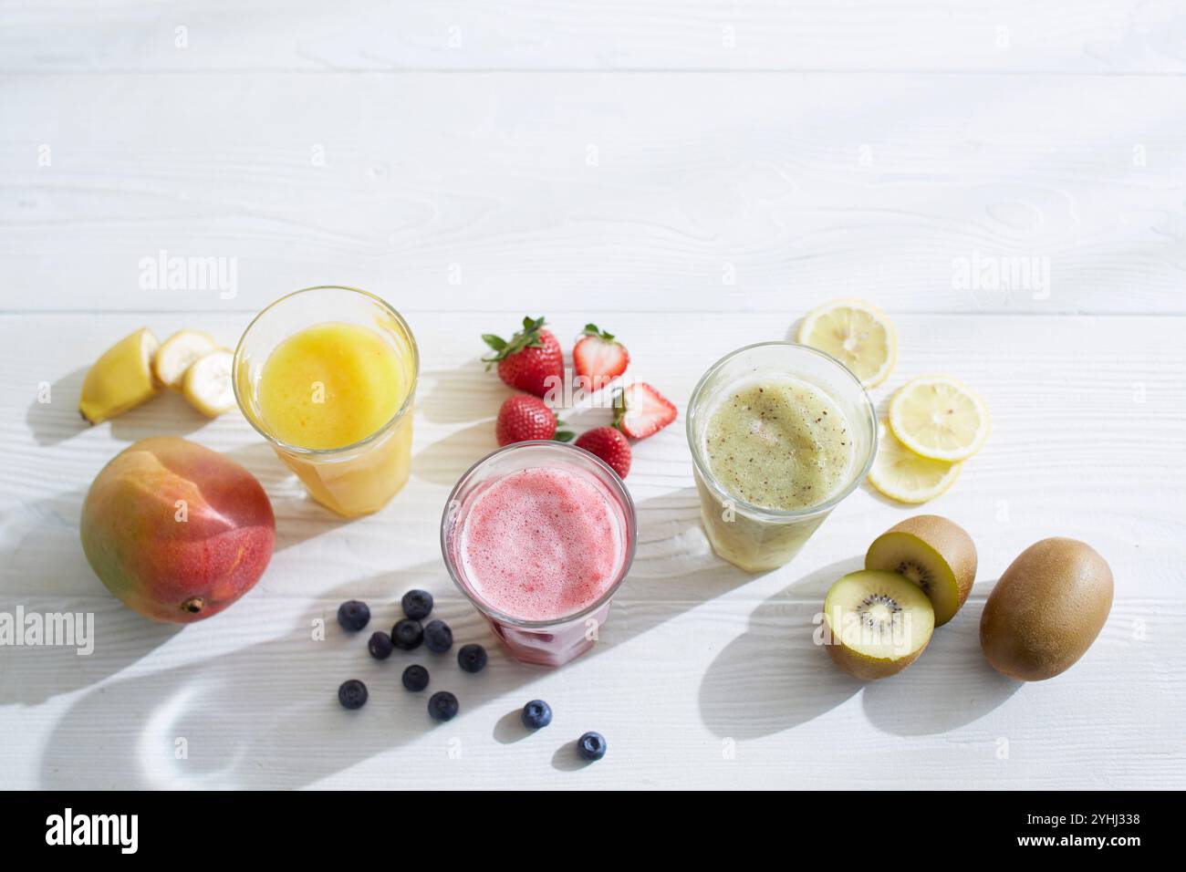 3 types of smoothies and fruit Stock Photo - Alamy