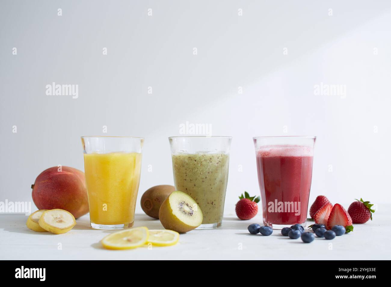 3 types of smoothies and fruit Stock Photo - Alamy