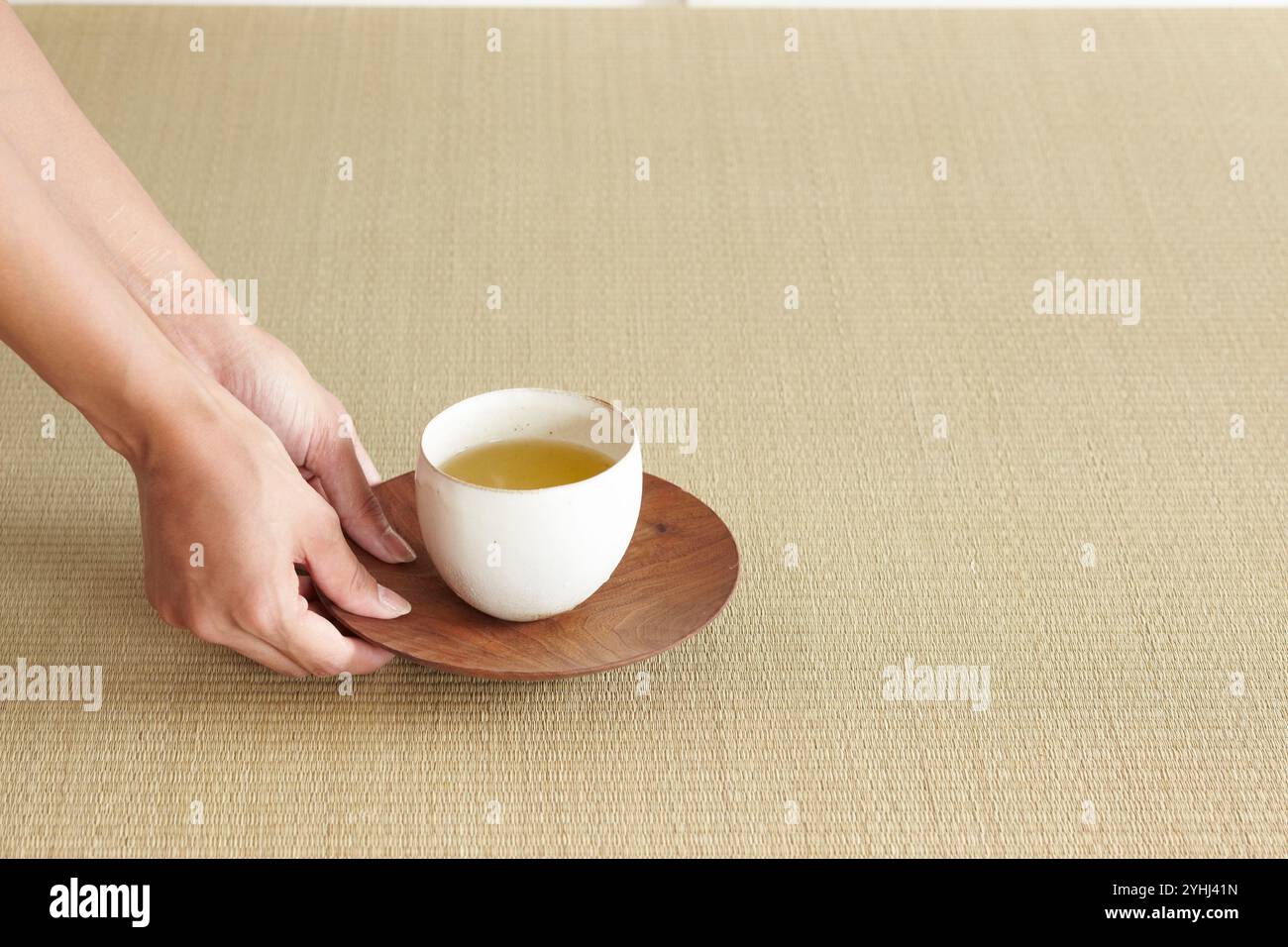 Offering tea hi-res stock photography and images - Alamy