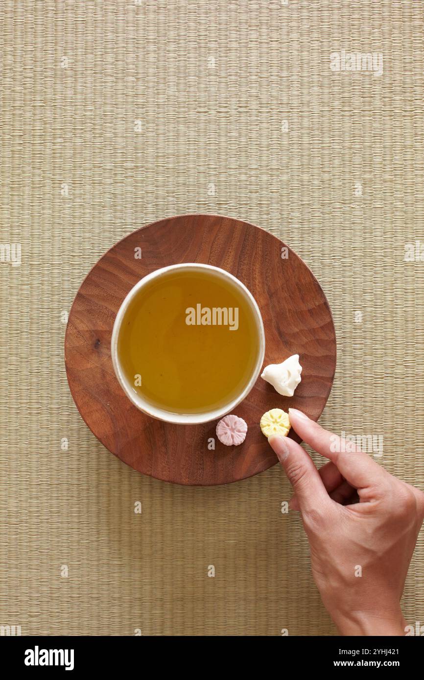 Woman picking up fallen hi-res stock photography and images - Alamy