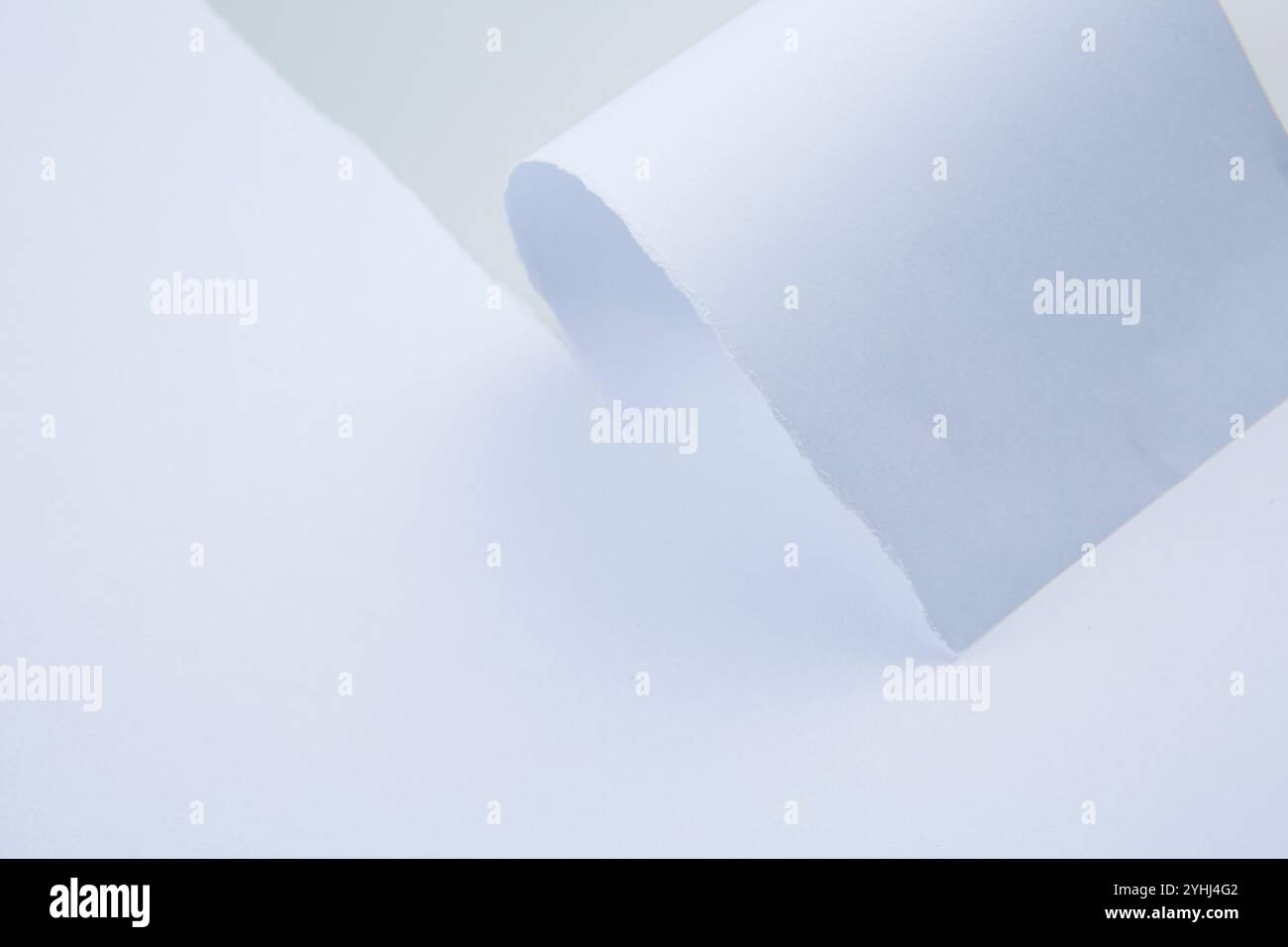 Paper in the process of being torn Stock Photo - Alamy