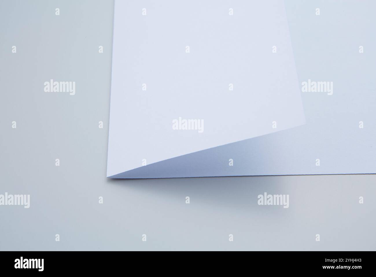 Folded sheet of white paper Stock Photo - Alamy