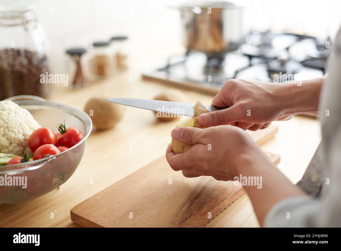 Man cooking in kitchen Stock Photo - Alamy