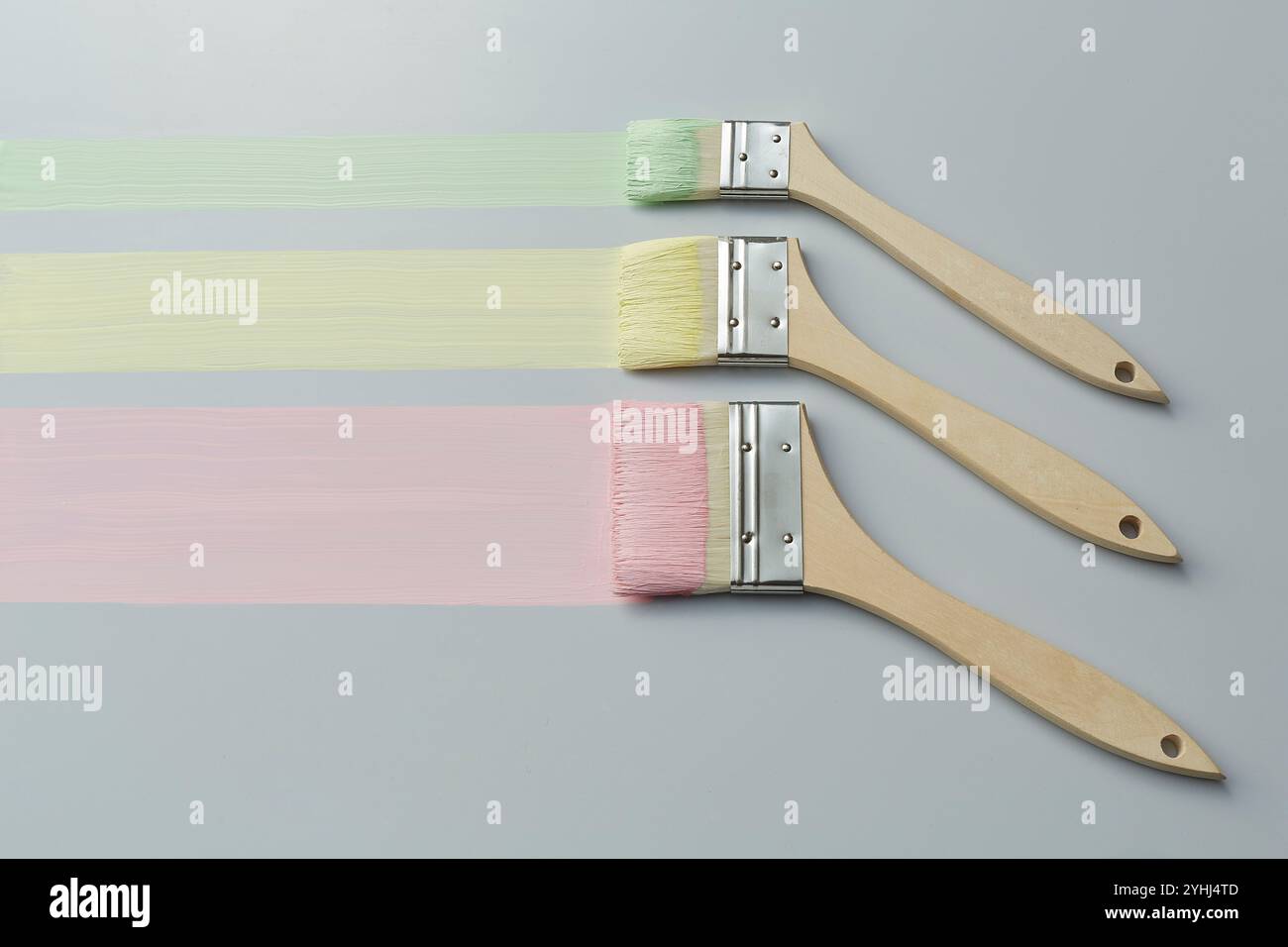 Three coloured lines painted with a brush Stock Photo - Alamy