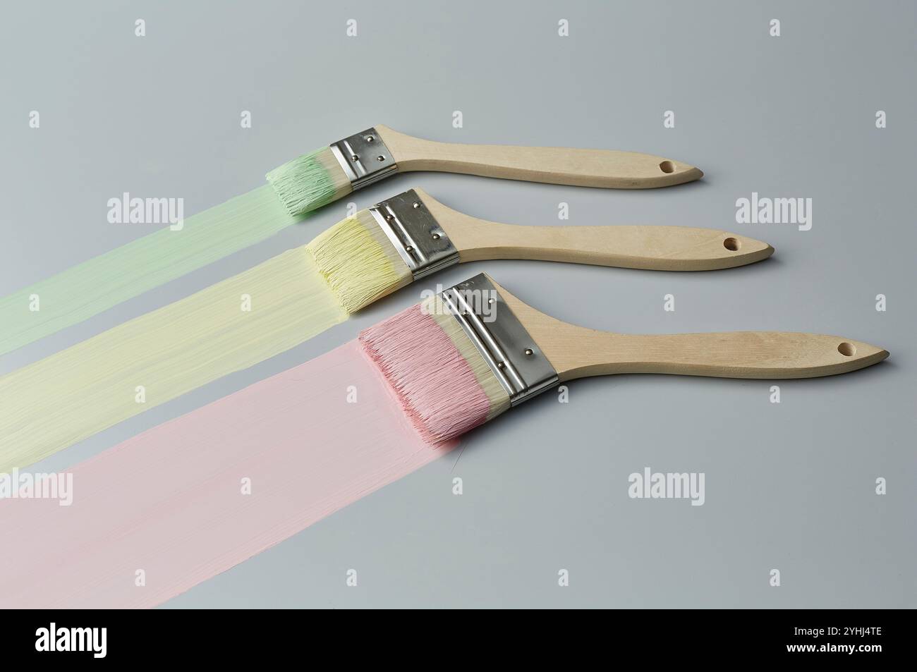 Three coloured lines painted with a brush Stock Photo - Alamy