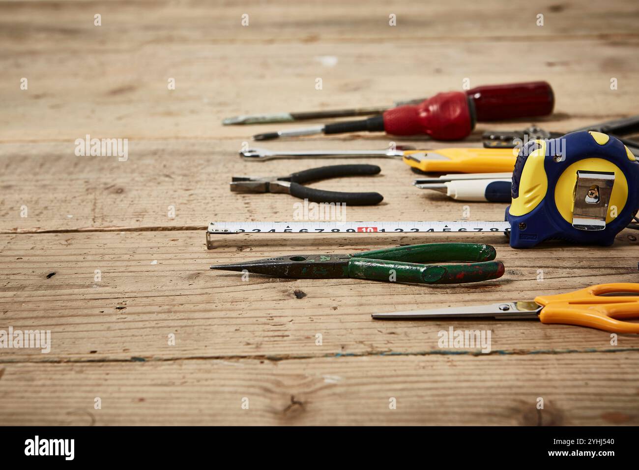 Tools laid out on the floor Stock Photo - Alamy