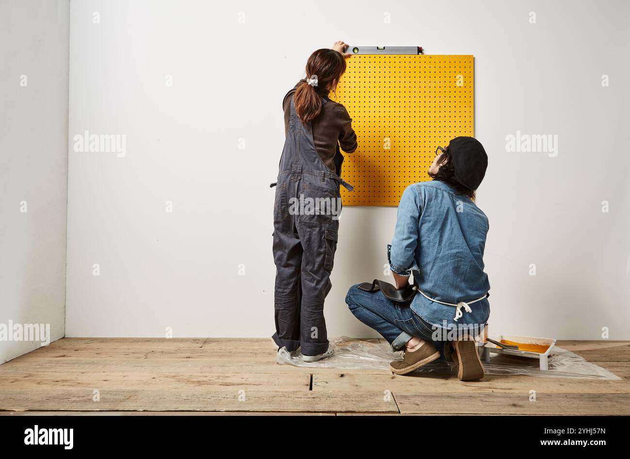 Woman mounting hi-res stock photography and images - Alamy