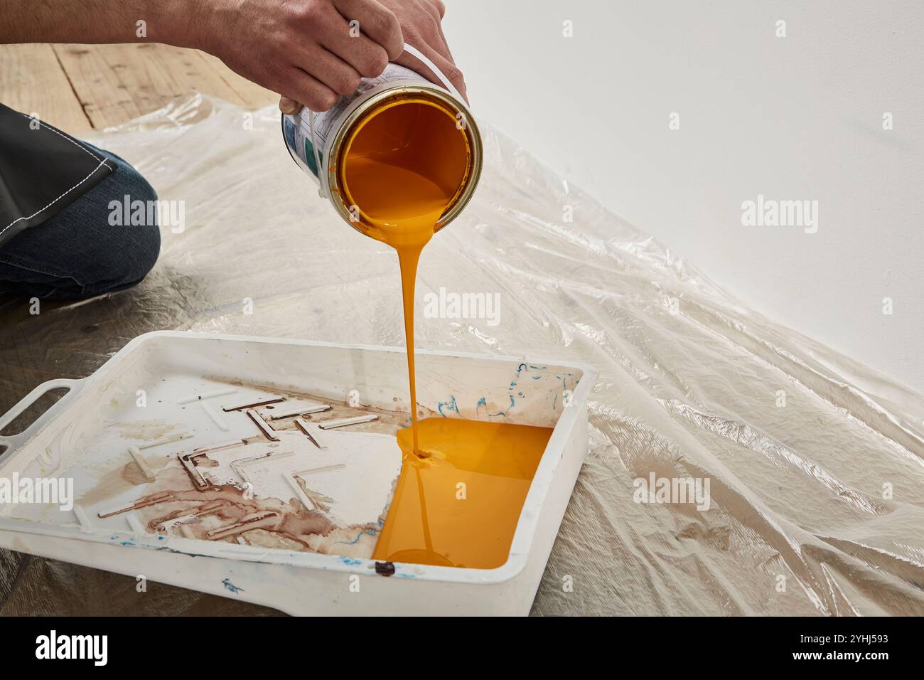 Person pouring paint hi-res stock photography and images - Alamy