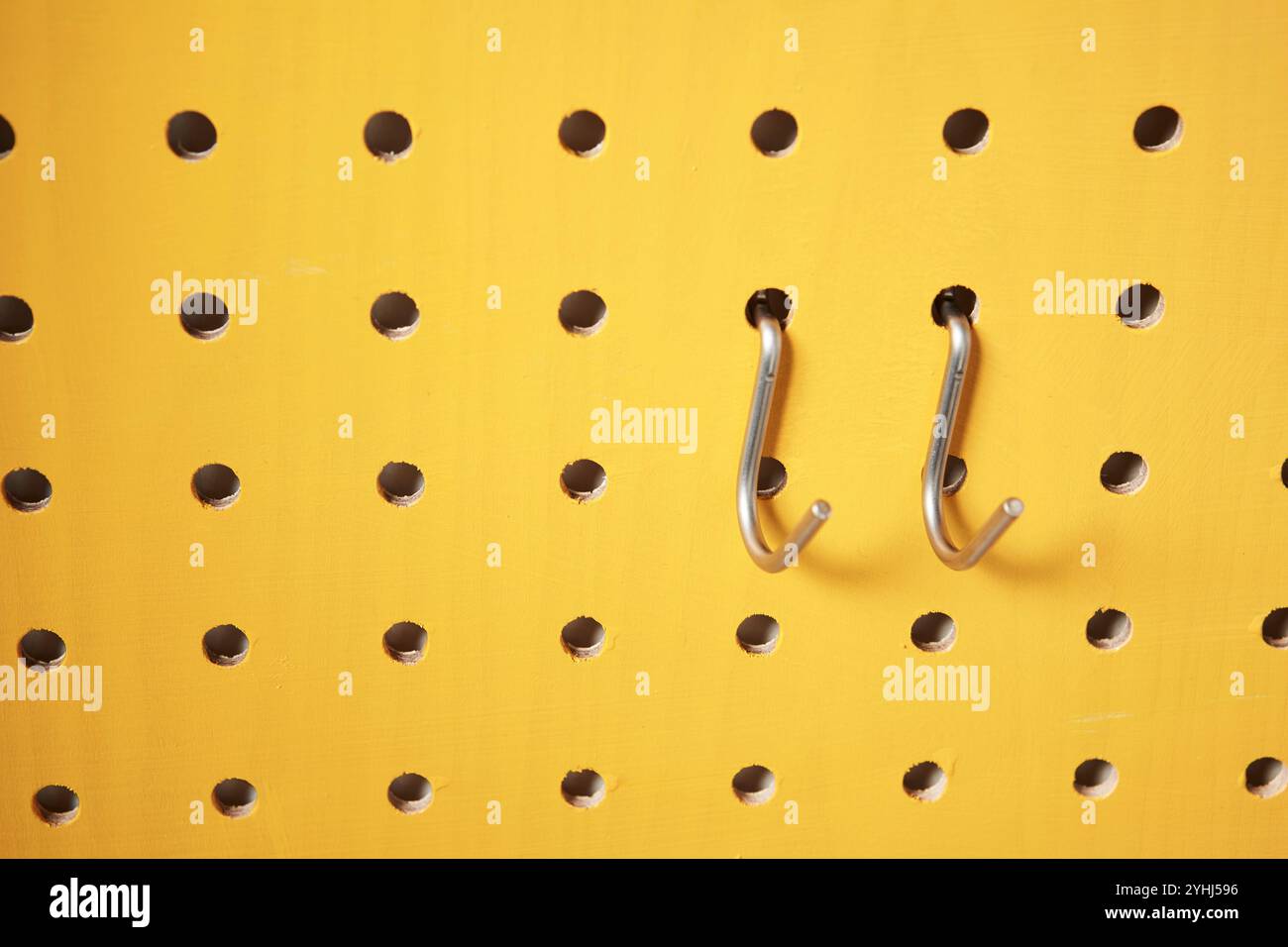 Perforated panels and hooks Stock Photo - Alamy